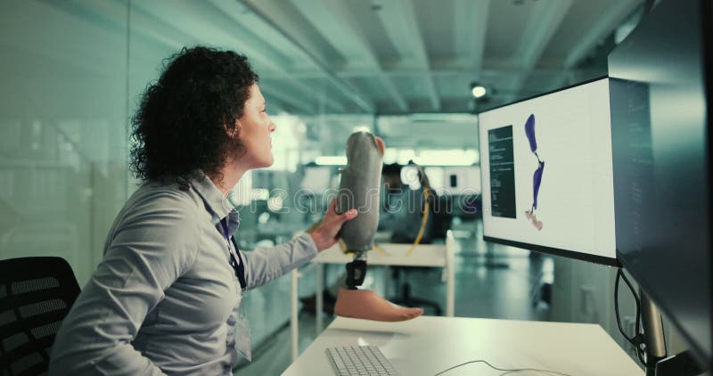 Lab, Development and Woman at Computer Screen with Prosthetic Leg ...