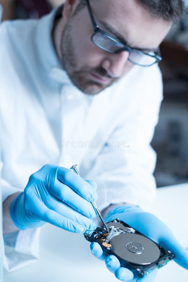 Lab Engineer Working on Broken Hard Disk Stock Image - Image of ...