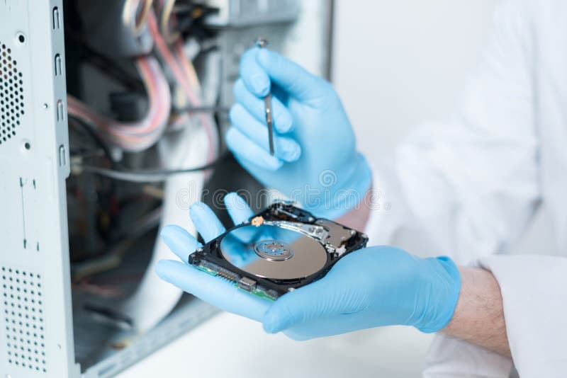 Broken up hard disk drives stock image. Image of components - 100061263