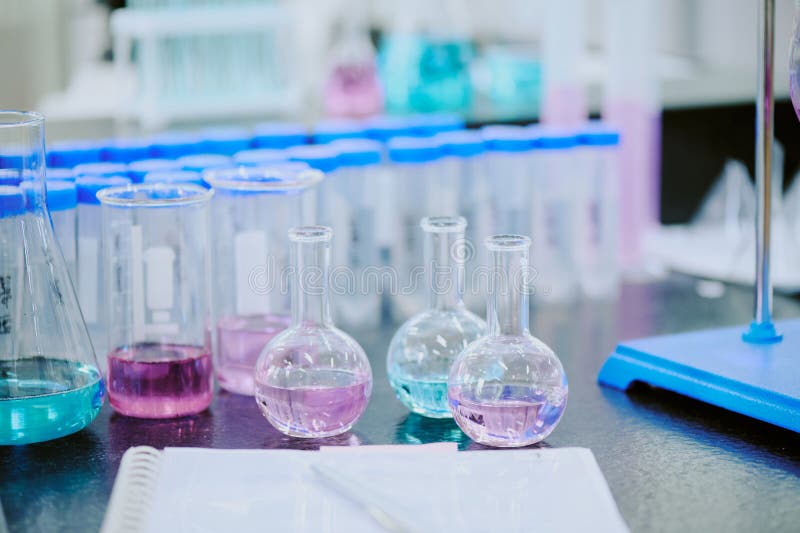 Lab Equipment Containing Various Colored Liquids Stock Photo - Image of ...
