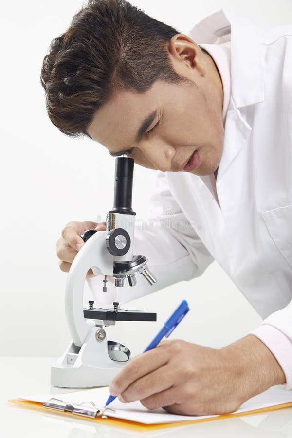 Lab Personnel Looking through a Microscope. Conceptual Image Stock ...