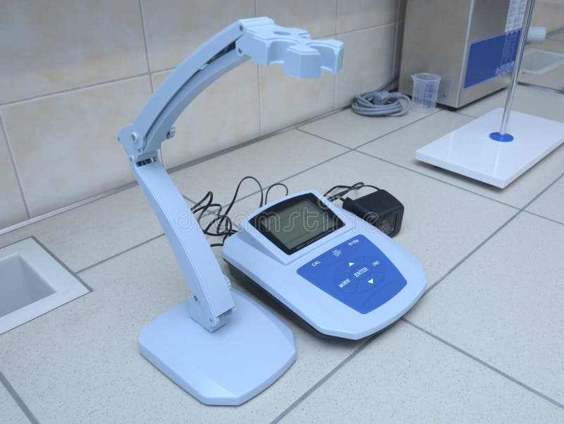 Lab PH Conductivity Meter and Lamp Set on Laboratory Worktable Stock ...