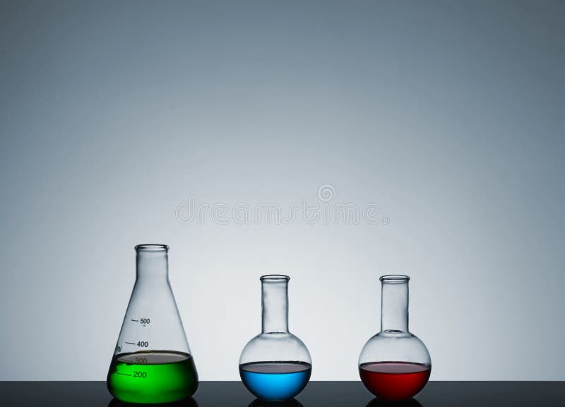 Lab Flasks with Colored Liquids, Lab Workplace Stock Photo - Image of ...