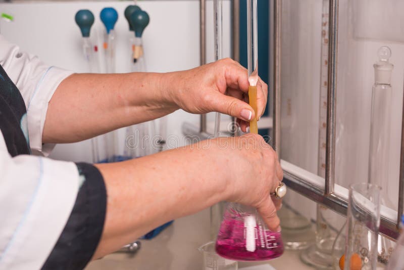 Lab Technician Doing Chemical Analysis. Testing Chemical Composition of ...