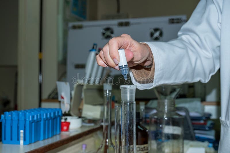 Lab Technician Doing a Chemical Test Stock Photo - Image of hygiene ...