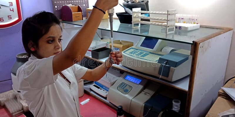 A Lab Technician Lady Staff Testing Samples at Laboratory Editorial ...