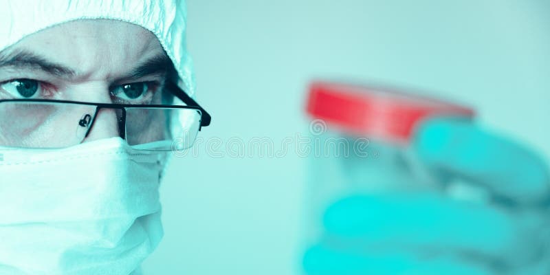 Lab Technician, Medic. Jar for Analysis. on the Face of a Protective ...