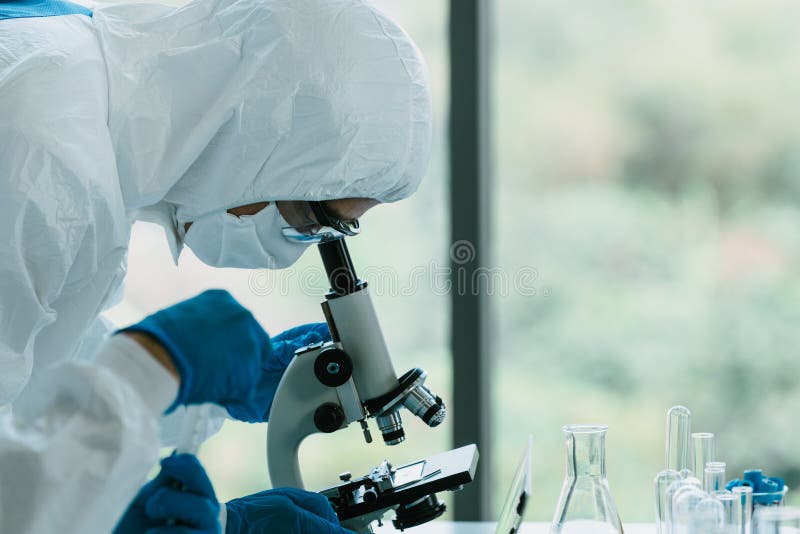 Lab Technician in Personal Protective Equipment PPE Suit Vaccines ...