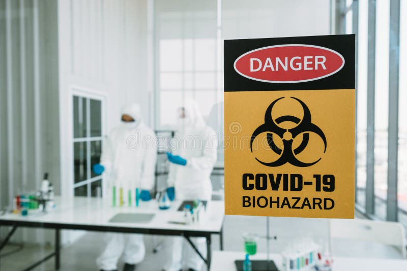 Lab Technician in Personal Protective Equipment PPE Suit Vaccines ...