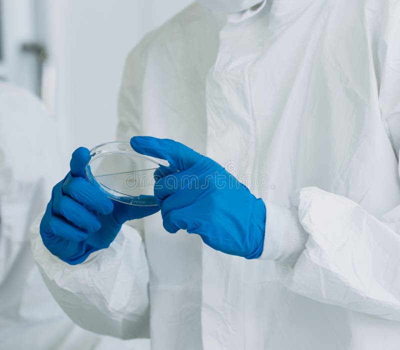 Lab Technician in Personal Protective Equipment PPE Suit Vaccines ...