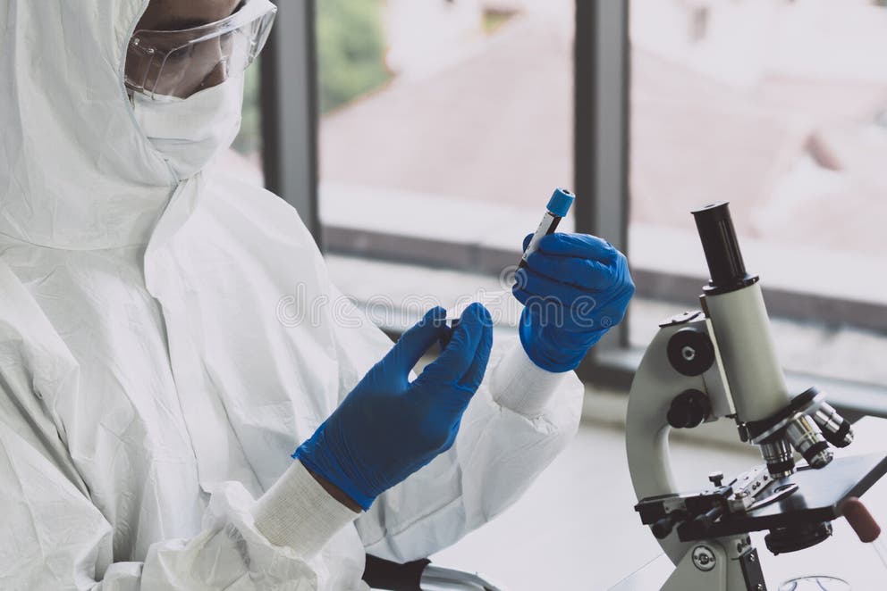Lab Technician in Personal Protective Equipment PPE Suit Vaccines ...