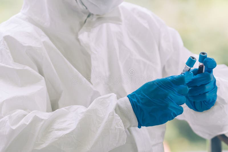 Lab Technician in Personal Protective Equipment PPE Suit Vaccines ...