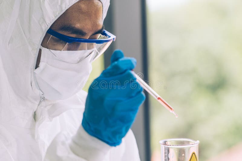 Lab Technician in Personal Protective Equipment PPE Suit Vaccines ...