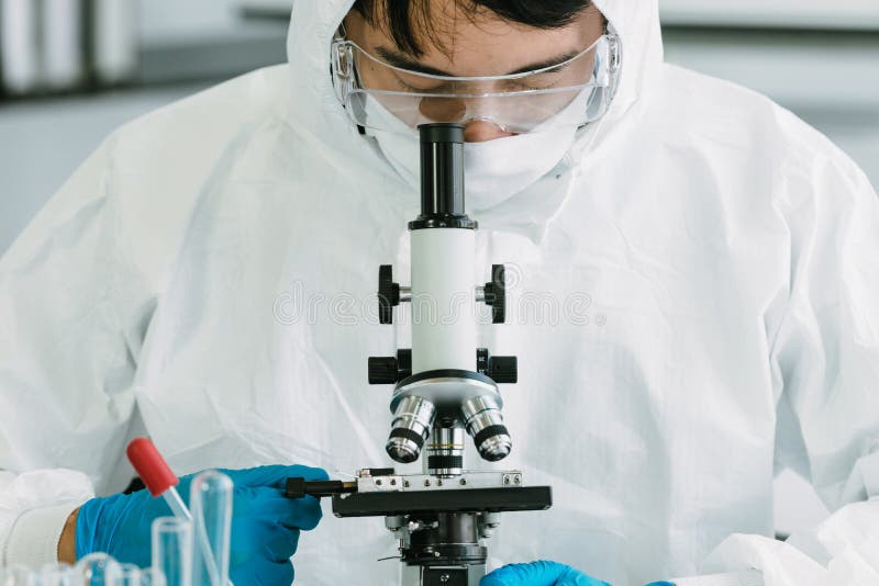 Lab Technician in Personal Protective Equipment PPE Suit Vaccines ...