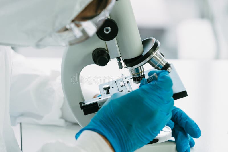 Lab Technician in Personal Protective Equipment PPE Suit Vaccines ...