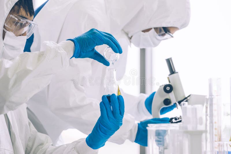 Lab Technician in Personal Protective Equipment PPE Suit Good Hand ...