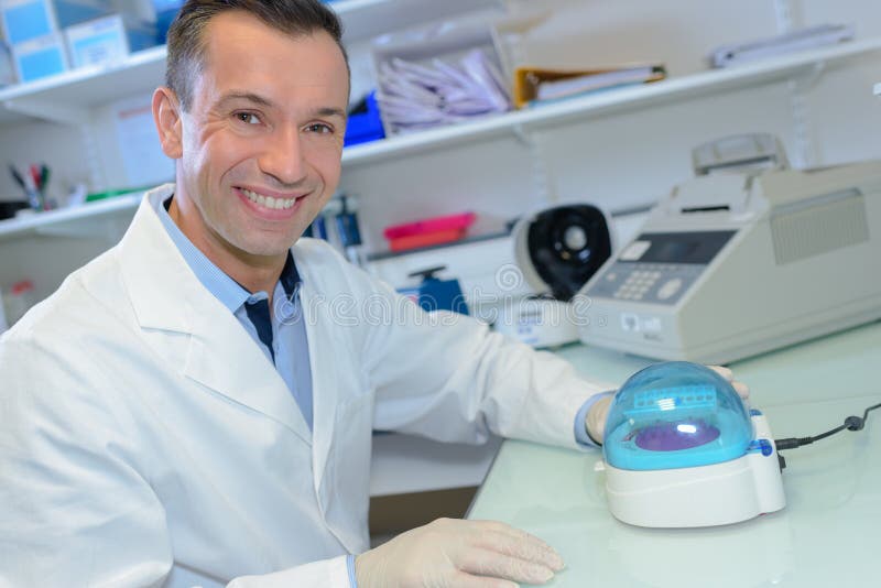 Lab technician smiling stock photo. Image of science - 231888022