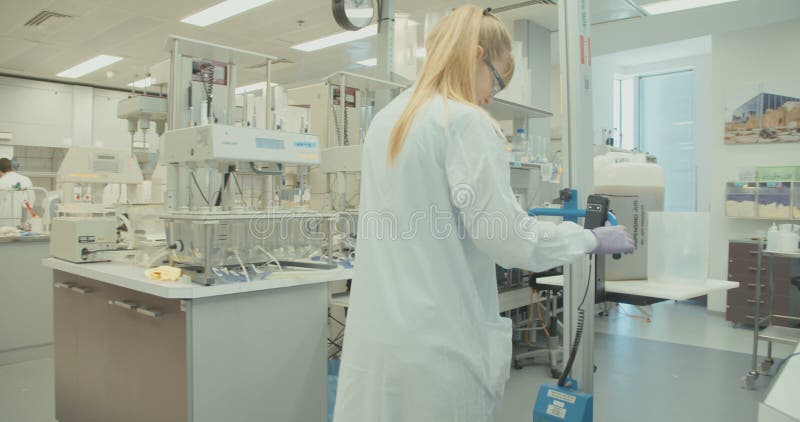 Lab Technician Working in a Pharmaceutical Company Laboratory Stock ...