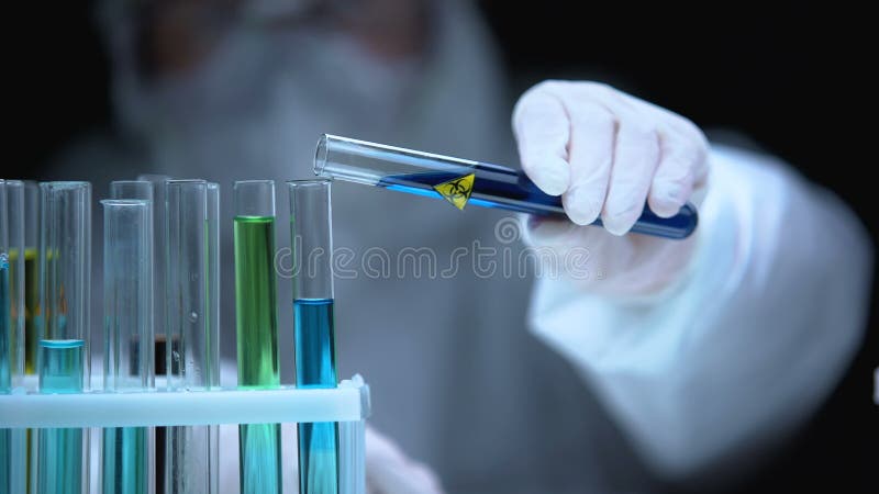 Lab Worker Adding Liquid in Tube with Biological Hazard Sign, Toxin ...