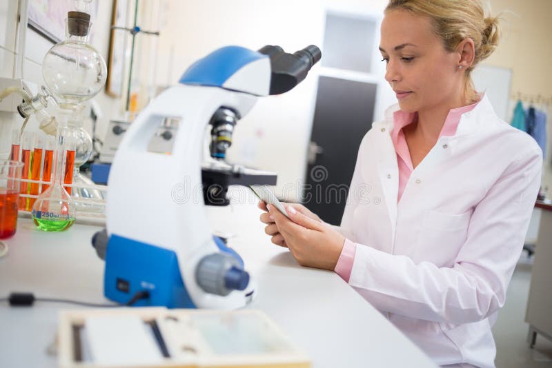 Lab Worker Look for Chemical Data at Ipod Stock Image - Image of look ...