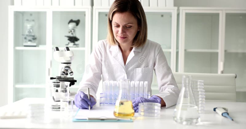 Lab Worker in Rubber Gloves Writes Analysis of Experiment Stock Video ...