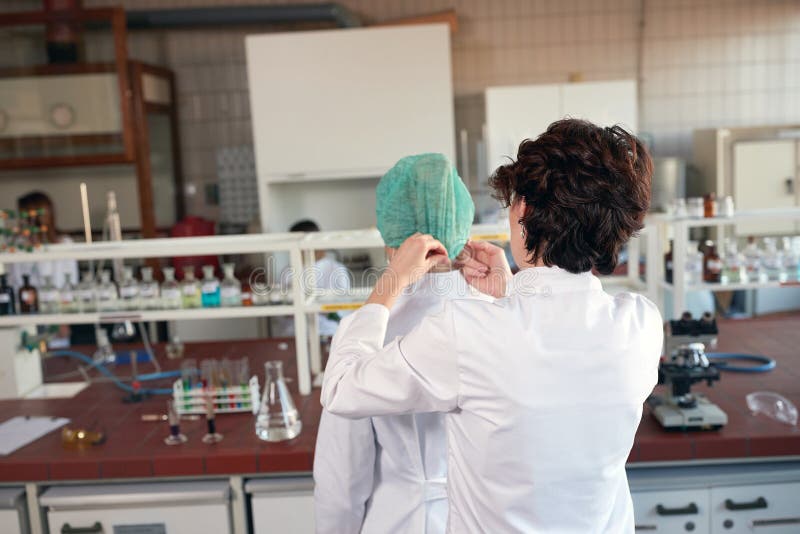 Lab Workers Putting Protect Cap Stock Image - Image of putting ...