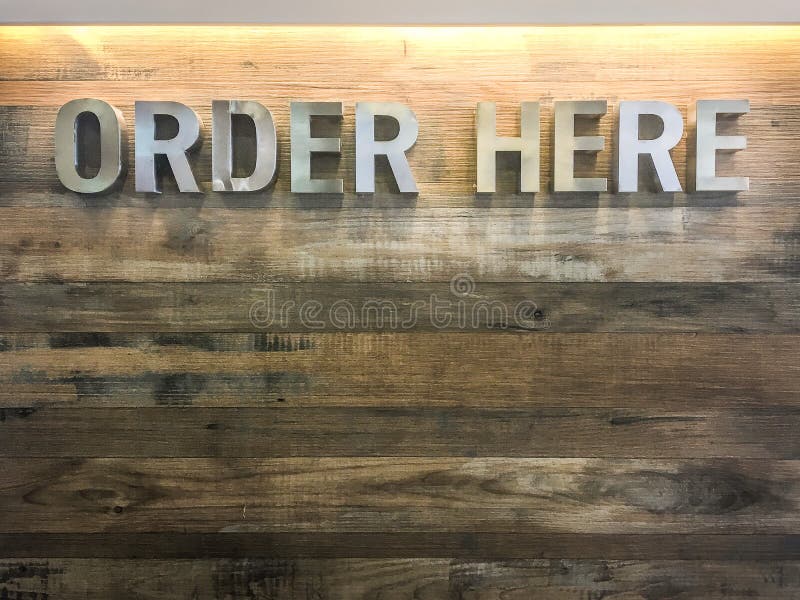 Order Here Sign Written on White Coffee Bar. Stock Photo - Image of ...