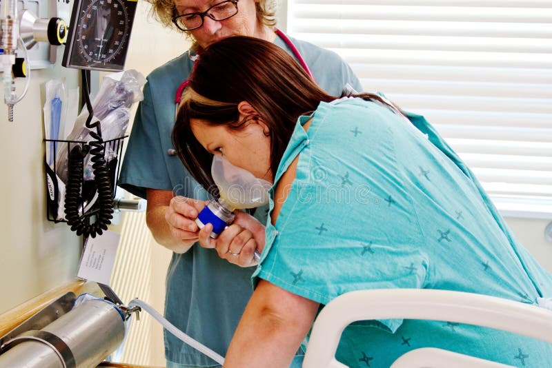 Woman in Active Labor Receiving Nitrous Oxide Stock Image - Image of ...