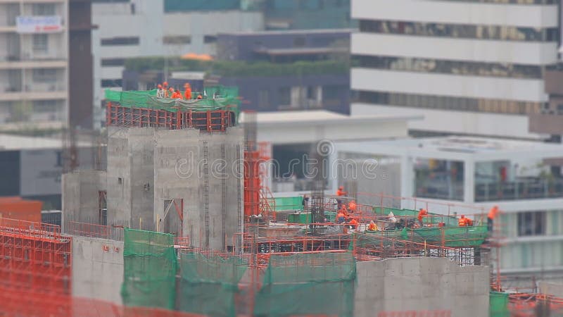 Building, Construction and Architect with a Team Working on Site while ...