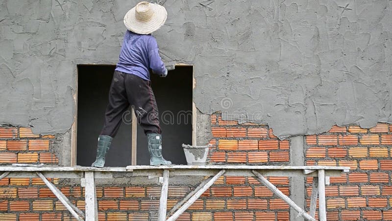 Labor Working Plaster Wall in Construction Site Stock Video - Video of ...