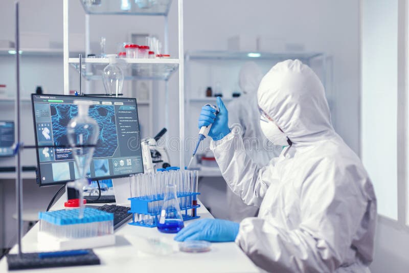 Laborant Working with Automatic Pipette and Test Tubes Stock Photo ...