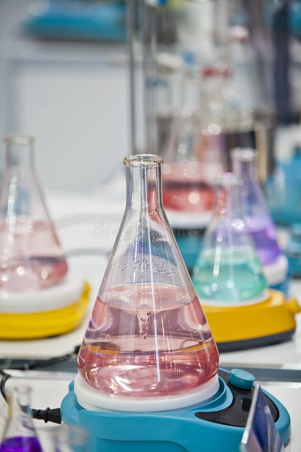 The Erlenmeyer or Conical Flasks on Bench Laboratory, with Range of ...