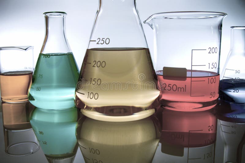 Bunsen Burner Heating Flask with Science Equipment in Laboratory Stock ...