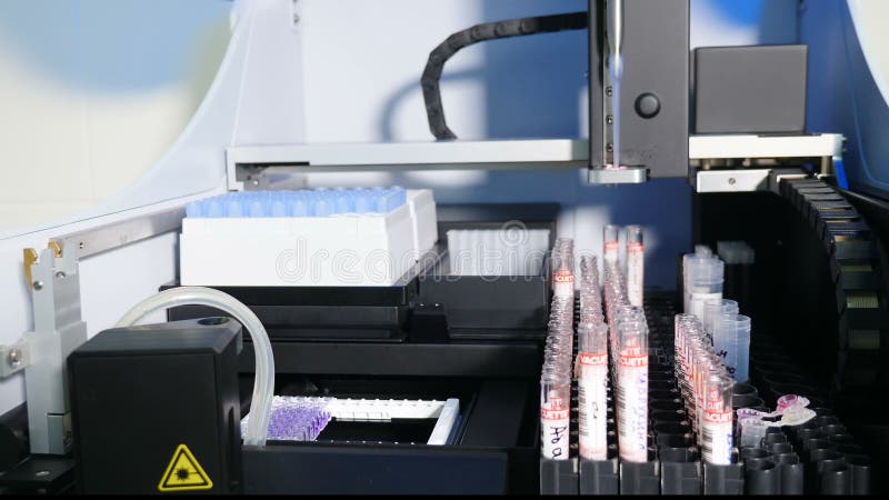 Laboratory Analysis and Diagnostic Machine. Robotic Manipulator Arms ...