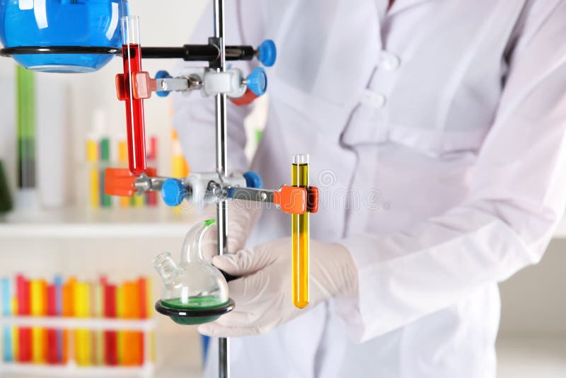 Laboratory Assistant Adjusting Stand with Test Tubes, Closeup Stock ...