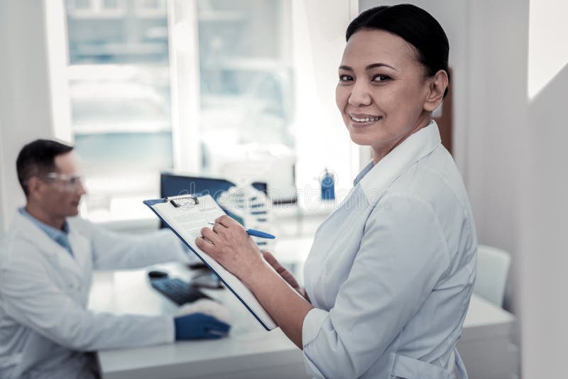 Laboratory Assistant Making Important Notes in the Laboratory Stock ...