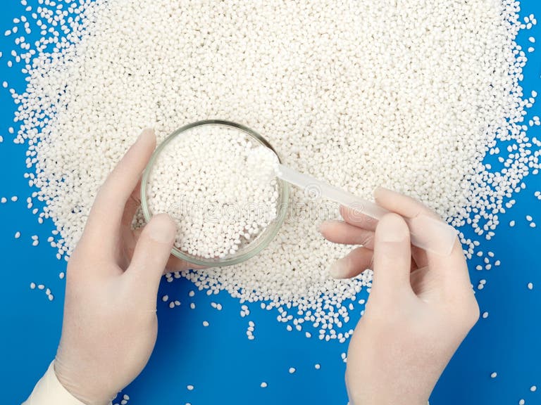 Laboratory Assistant Taking New Batch of White Plastic Polymer Granules ...