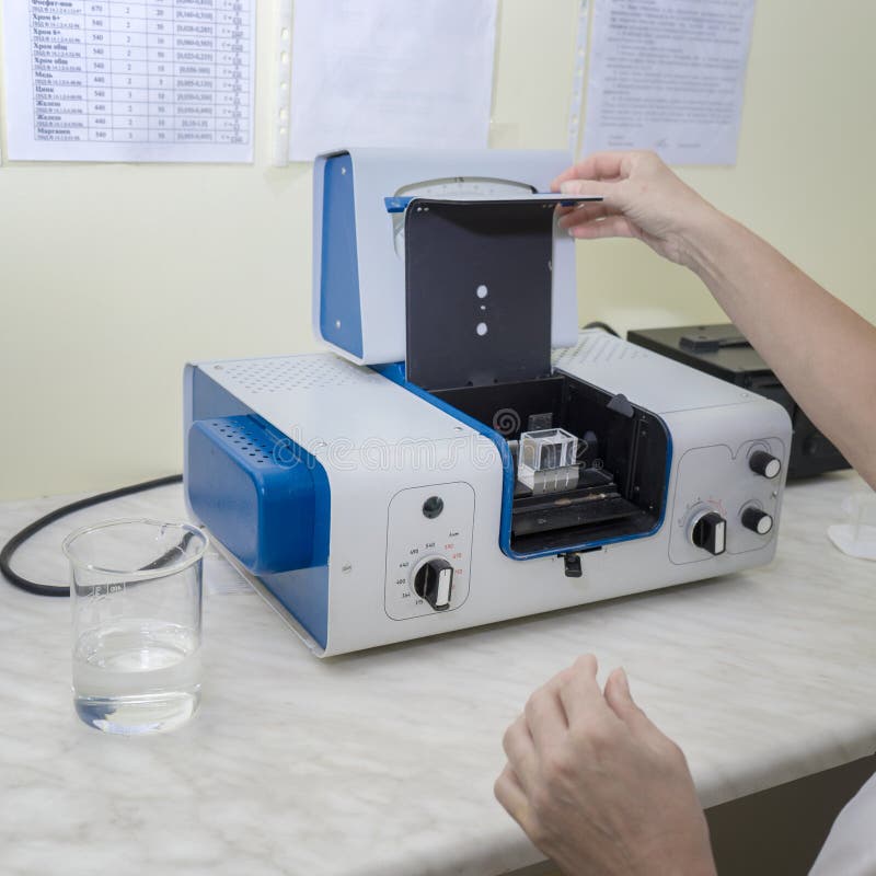 Laboratory Assistant Working Prepare Instrument for Chemical Lab ...