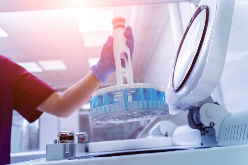 Laboratory Assistant Works with Microwave Hybrid Tissue Processor at ...