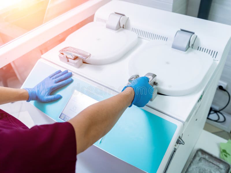 Laboratory Assistant Works with Microwave Hybrid Tissue Processor at ...