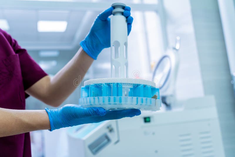 Laboratory Assistant Works with Microwave Hybrid Tissue Processor at ...