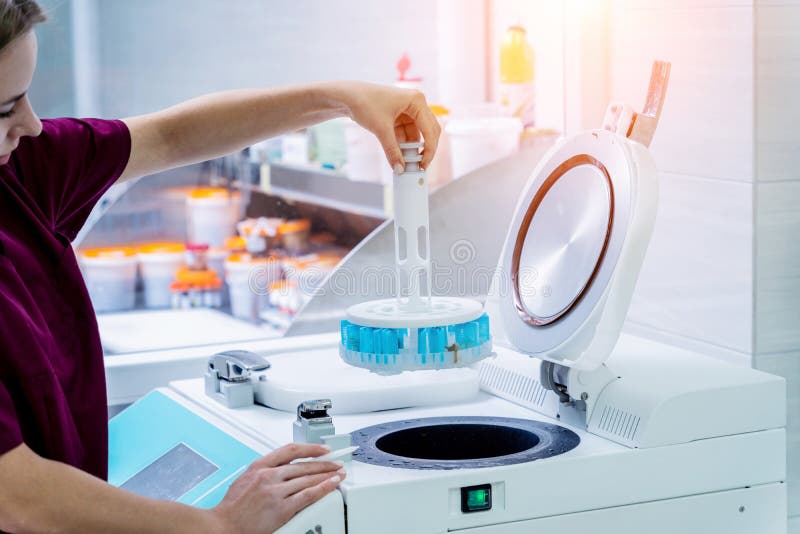 Laboratory Assistant Works with Microwave Hybrid Tissue Processor at ...