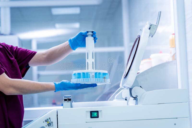 Laboratory Assistant Works with Microwave Hybrid Tissue Processor at ...