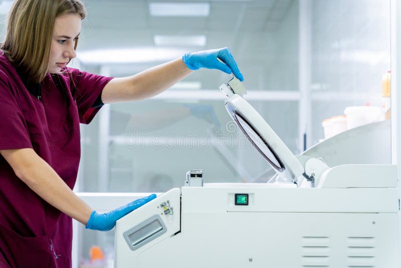 Laboratory Assistant Works with Microwave Hybrid Tissue Processor at ...