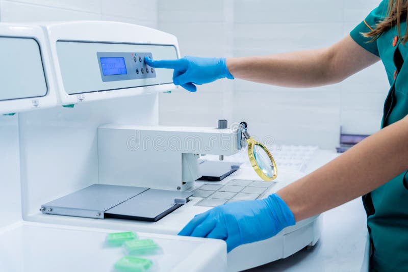 Laboratory Assistant Works at Paraffin Wax Dispenser Tissue Embedding ... Laboratory Assistant Works at Paraffin Wax Dispenser Tissue Embedding ...