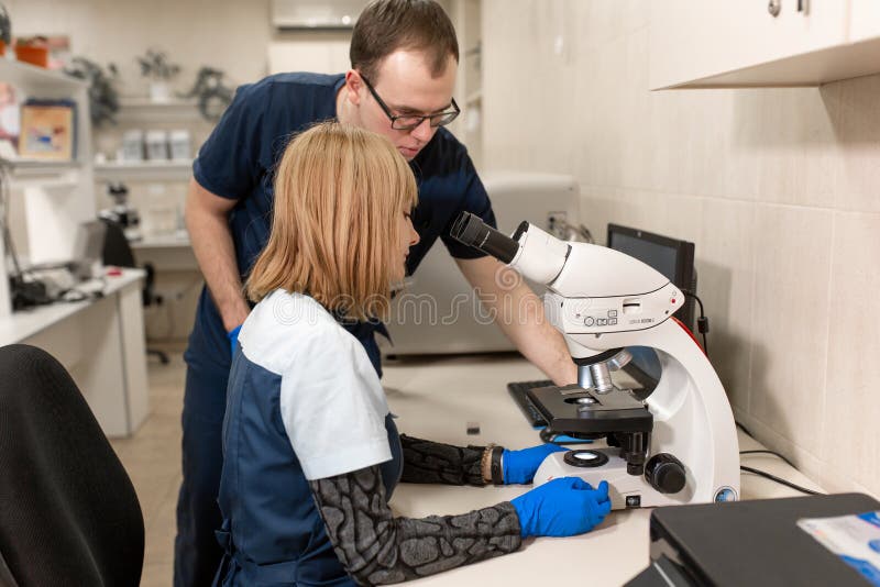 Two Laboratory Assistants Kids Stock Photo - Image of looking, chemical ...