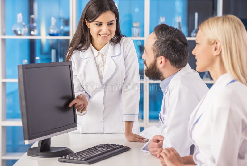 Beautiful Female Computer Expert Professional Technician Examining ...