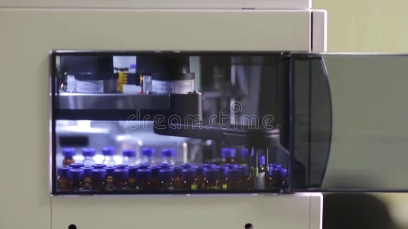 Laboratory Automatic Machine. Auto Clips Installed in Her Plastic Tubes ...