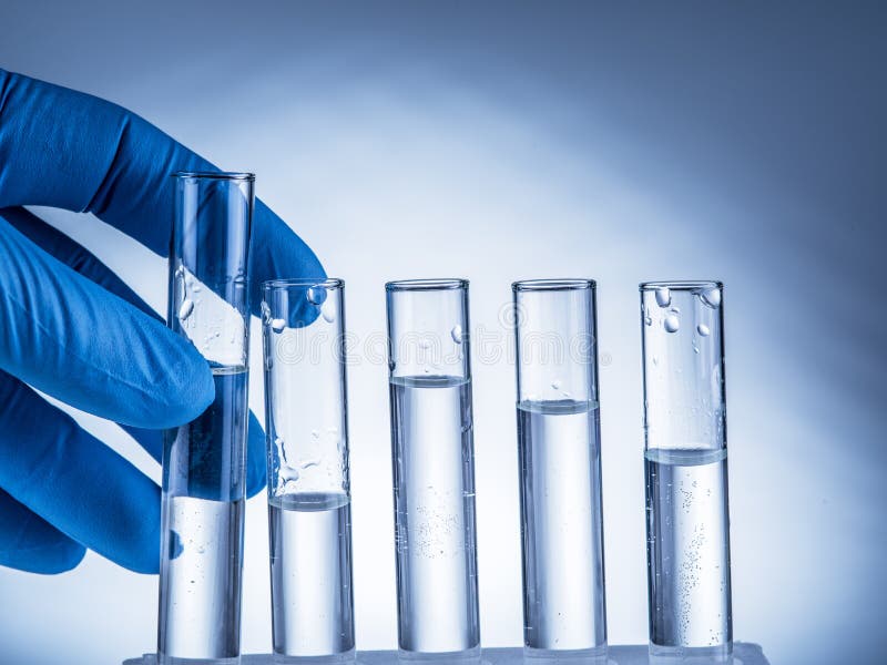 Laboratory Beakers in Analyst`s Hand. Stock Photo - Image of colour ...
