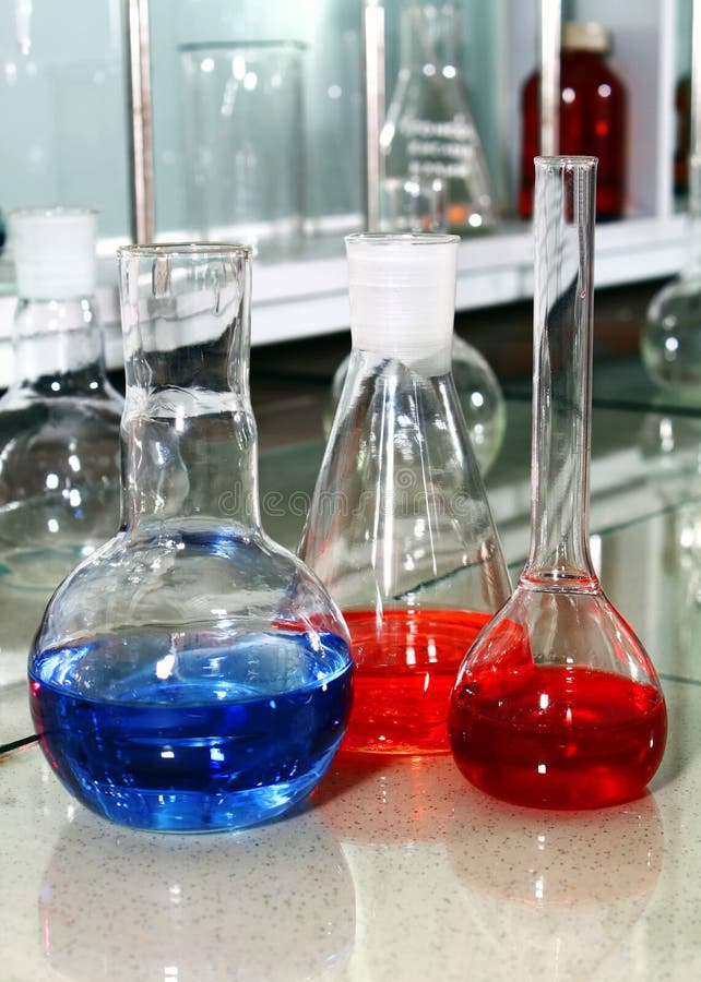 Laboratory Beakers with the Coloured Liquid Stock Photo - Image of ...